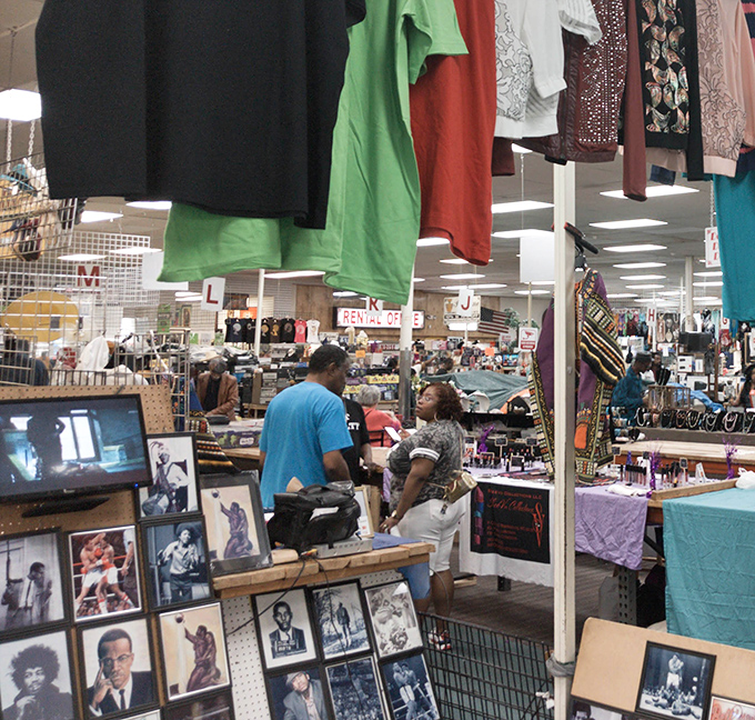 The market's true character emerges in these impromptu exchanges between vendors and shoppers – commerce with conversation, the old-fashioned way.