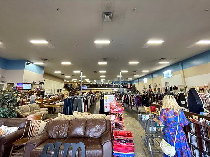 A treasure hunter's paradise where leather couches lounge next to racks of potential wardrobe upgrades. The thrill of the hunt is palpable!