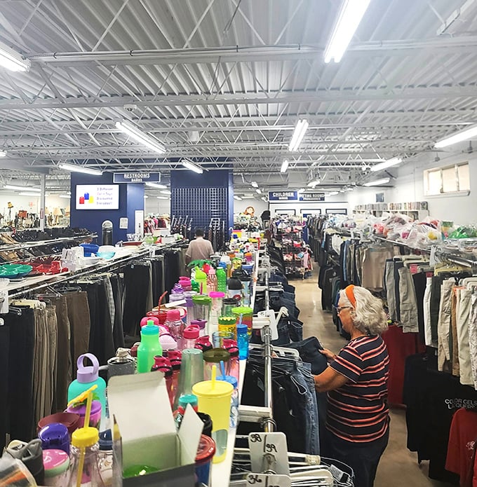 Serious thrifters know the drill – methodically scan each rack, never rush, and always check that center aisle for fresh merchandise.