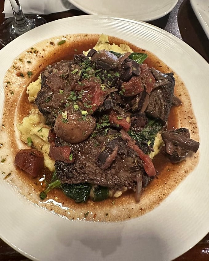 This isn't just beef—it's a short rib masterpiece swimming in its own glorious juices. The kind of dish that makes conversation stop and eyes close in silent appreciation.