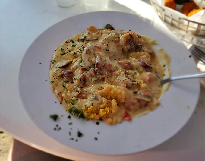 Their shrimp and grits isn't just a dish, it's Southern poetry – creamy, savory, and rich enough to make your cardiologist wince approvingly.