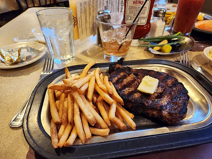 The perfect Wisconsin equation: one perfectly grilled sirloin + golden fries + an old fashioned = happiness on a sizzling platter.