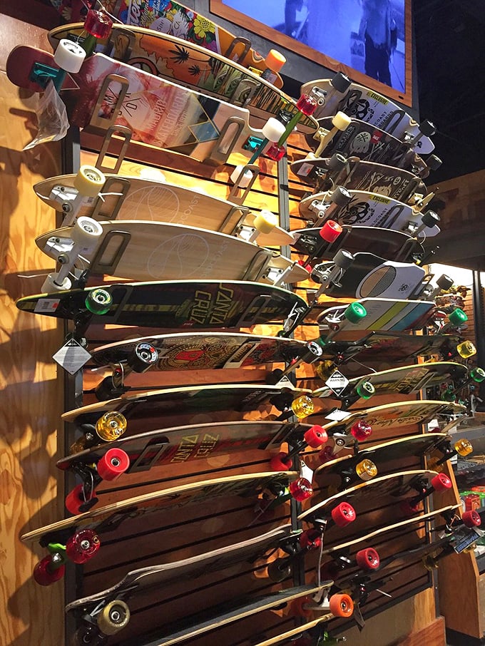 Skateboards line the wall like colorful works of art, tempting both teenagers and the middle-aged men still clinging to their youth.