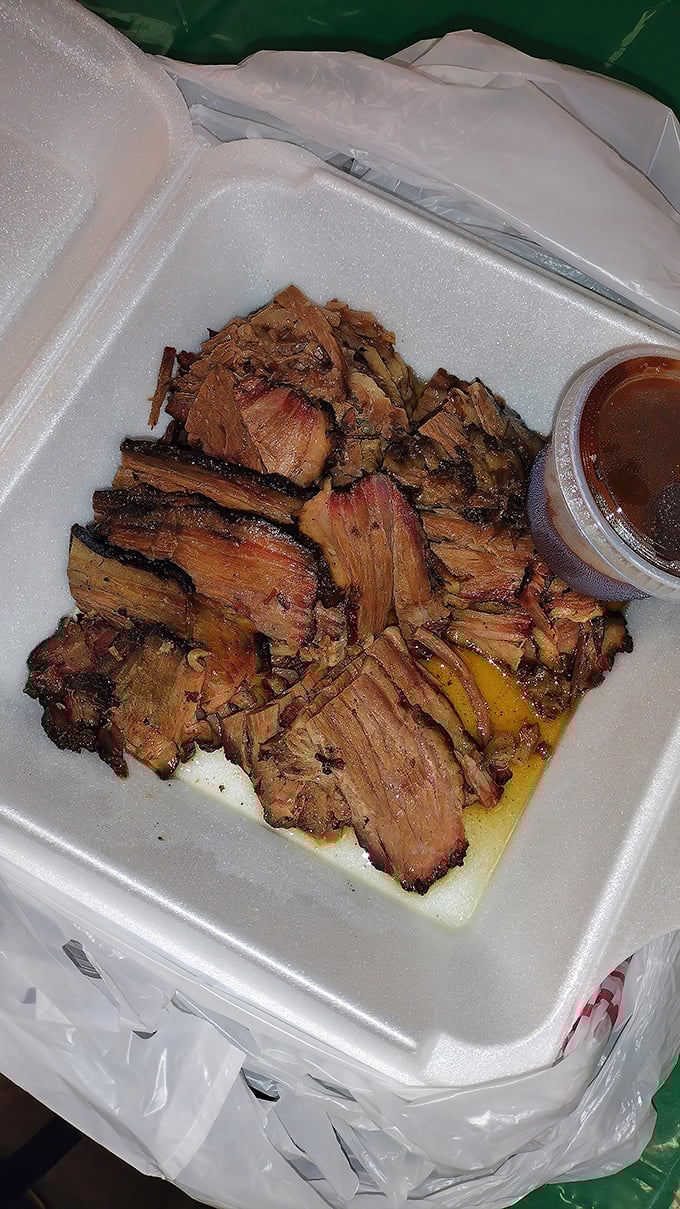 Brisket that speaks the universal language of smoke and patience. Each slice tells the story of hours in the smoker.