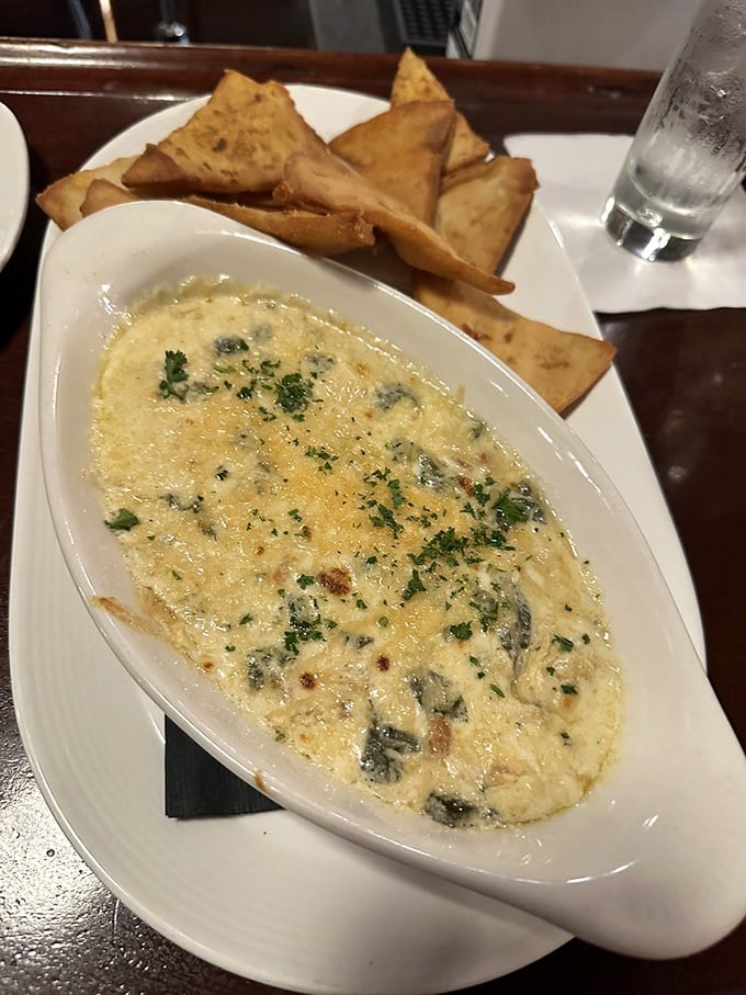 This creamy dip with crispy pita triangles isn't just an appetizer—it's the opening act of a meal that deserves a standing ovation.