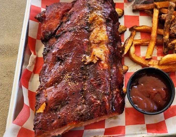 These ribs don't just fall off the bone—they practically leap into your mouth with a perfect bark that would make tree surgeons jealous.