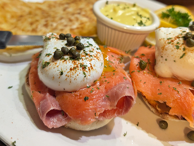 Smoked salmon and poached eggs crowned with capers—proof that breakfast can be both sophisticated and deeply satisfying at the same time.