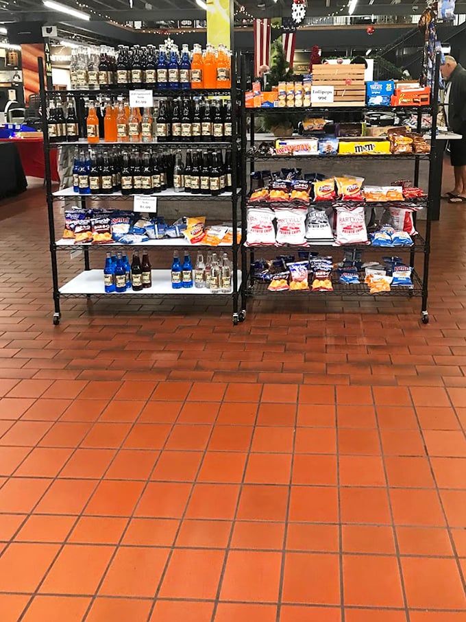 The snack aisle – where diet plans go to die and road trip provisions are born. Those nostalgic sodas alone are worth the drive.