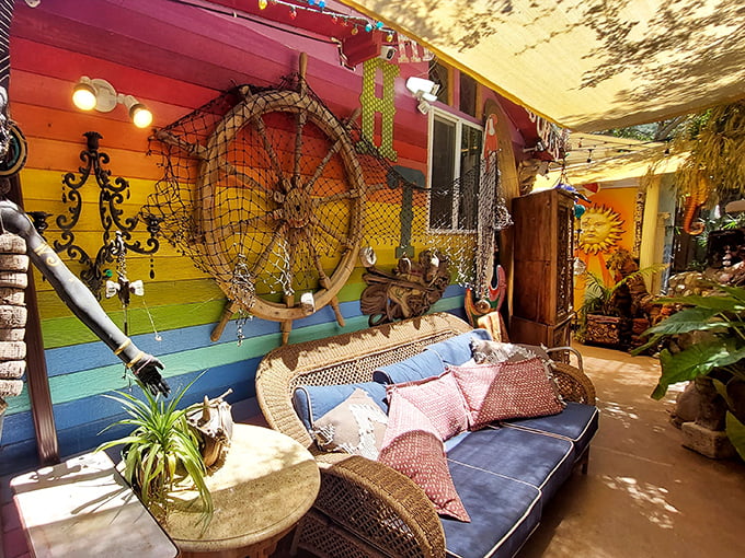 Sunshine, wicker, and a rainbow wall—proof that sometimes the best design is equal parts bold and breezy.