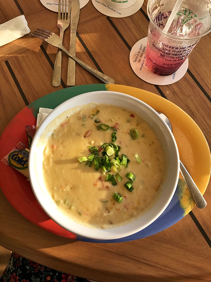 Comfort in a bowl! Their creamy seafood chowder arrives topped with fresh green onions—like a warm Florida hug on even the sunniest days.