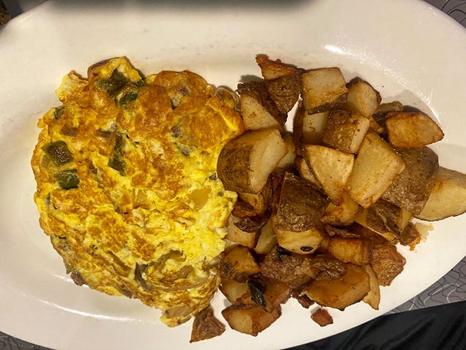 This Southern omelet practically overflows with golden goodness, making even Yankees consider relocating down south.