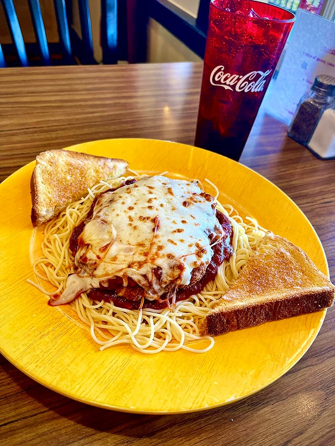 Spaghetti and meatballs elevated to an art form, with melted cheese that stretches like the best kind of relationship—committed but flexible.