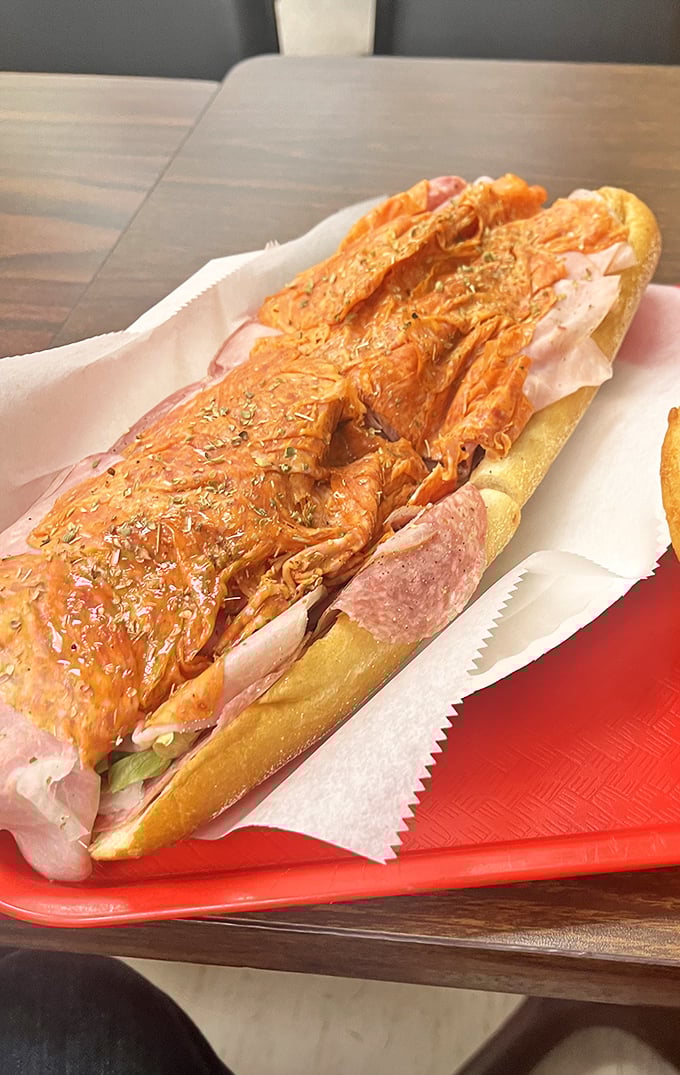 The Italian sub—where meat, cheese, and seasonings perform a beautiful ballet of flavor. That roll isn't just holding ingredients; it's cradling dreams.