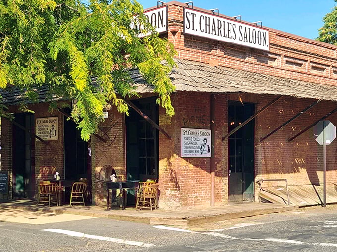 The St. Charles Saloon invites weary travelers to rest their boots and wet their whistles, its brick façade having witnessed countless celebrations and sorrows since gold fever struck.