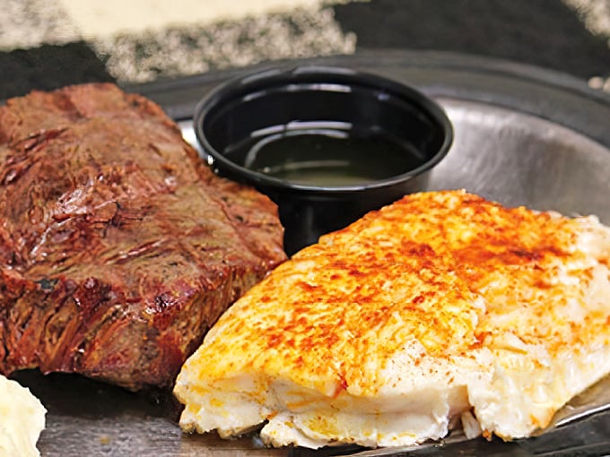 When land meets sea on a single plate – a steak cooked with respect alongside haddock that would make Lake Michigan proud.