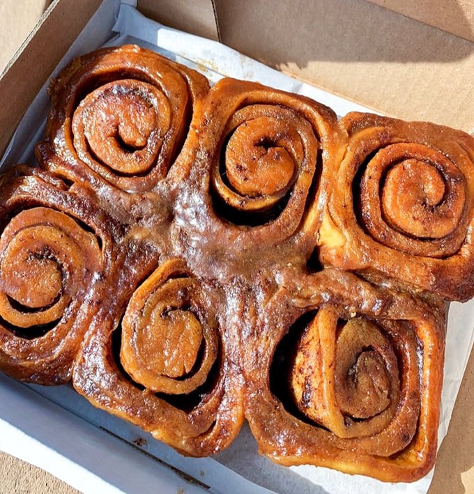 These aren't just sticky buns—they're edible architecture, with each glossy, caramelized swirl supporting the weight of your expectations perfectly.