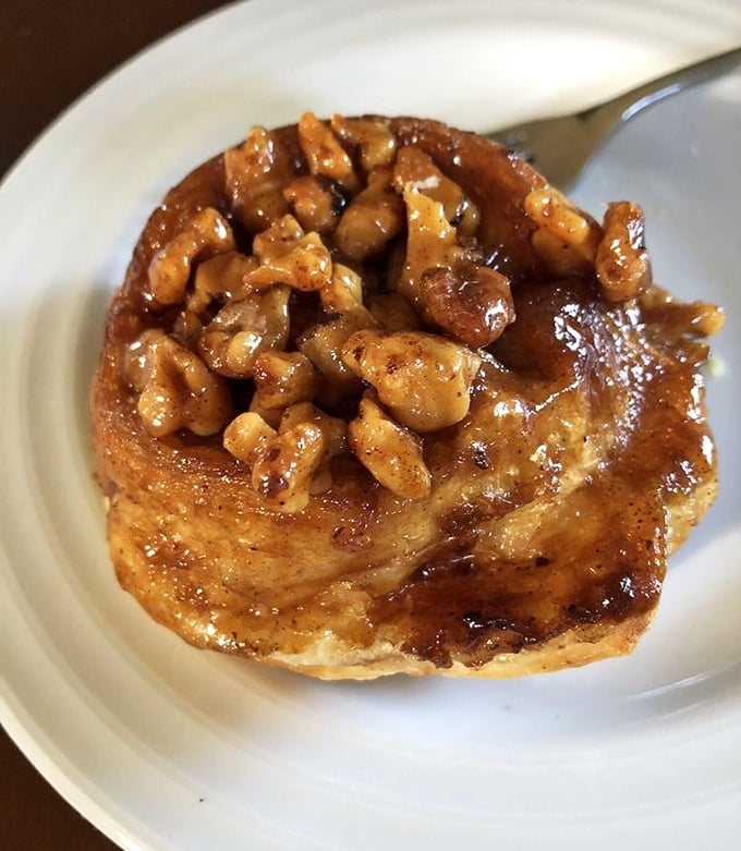 Sticky bun nirvana – where caramelized walnuts and gooey goodness create what breakfast aspires to be in its sweetest dreams.