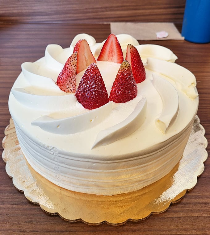 Strawberry shortcake perfection that would make Mary Berry weep tears of joy—precision, beauty, and balance in every slice.