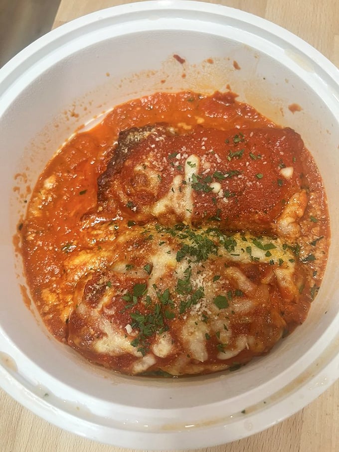 Behold, the stuffed eggplant—where cheese meets marinara in a bubbling romance that would make even a vegetable skeptic swoon.