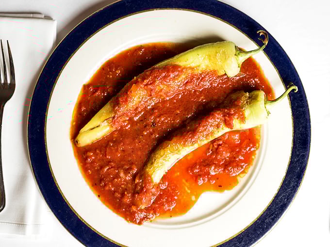 These stuffed peppers aren't just appetizers, they're a Cleveland tradition elevated to art form, swimming in bright, vibrant sauce.