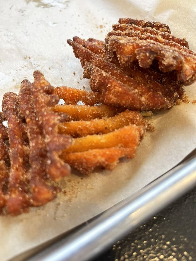 These sweet potato fries aren't just side characters—they're crispy, seasoned co-stars that might upstage the main attraction if you're not careful.