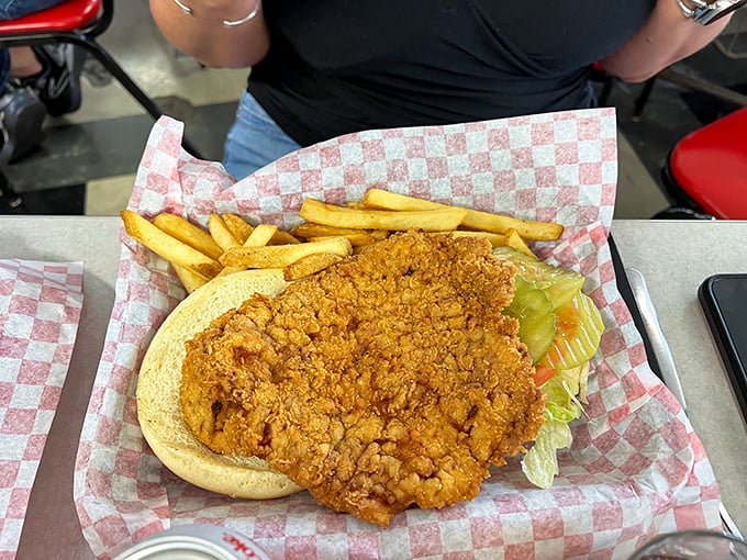 The tenderloin that ate Indianapolis – this breaded pork masterpiece follows the sacred Hoosier commandment: "Thou shalt extend well beyond thy bun."