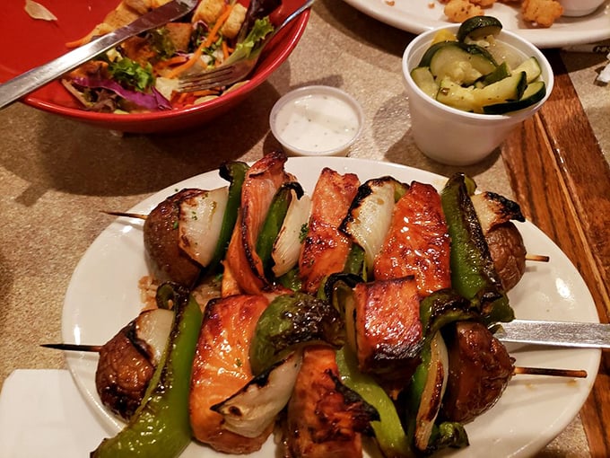 Teriyaki salmon kabobs that could make a pescatarian weep with joy—colorful, charred to perfection, and bursting with flavor.