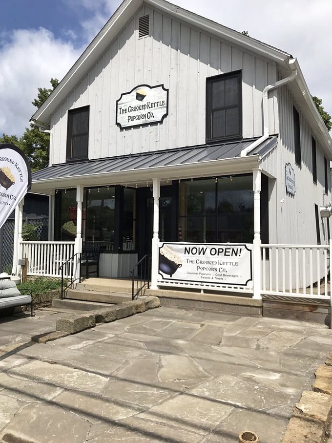 The Crooked Kettle Popcorn Co. isn't just a shop—it's an aromatic experience housed in a picture-perfect white building that practically begs you to come inside.