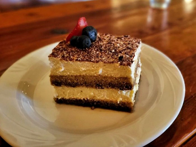 Tiramisu that strikes the perfect balance between coffee-soaked decadence and cloud-like mascarpone. The berries are just showing off.