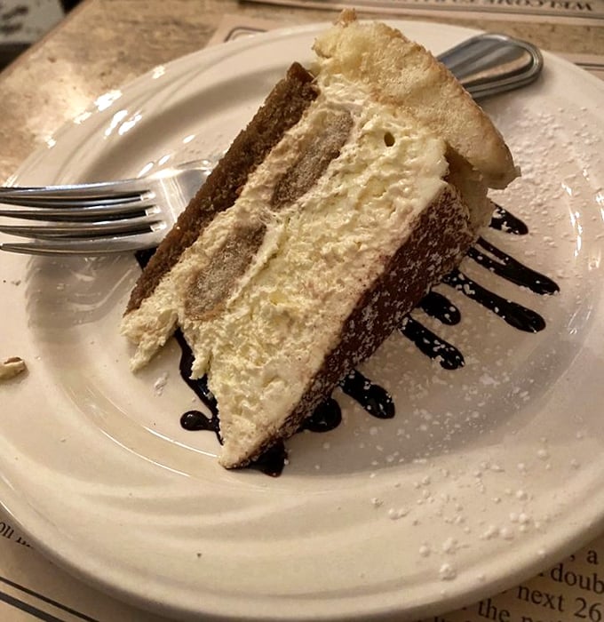 Layer upon layer of heaven. This tiramisu doesn't just satisfy your sweet tooth—it writes it a love letter.
