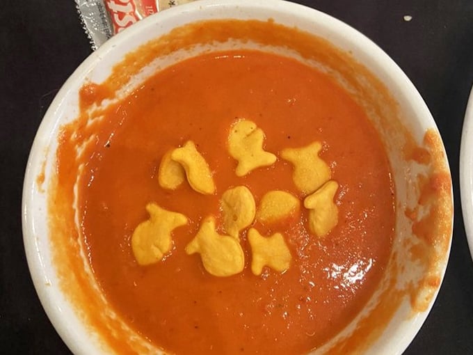Tomato soup with goldfish crackers swimming happily on top—childhood comfort reimagined for grown-up taste buds but still sparking that same joy.