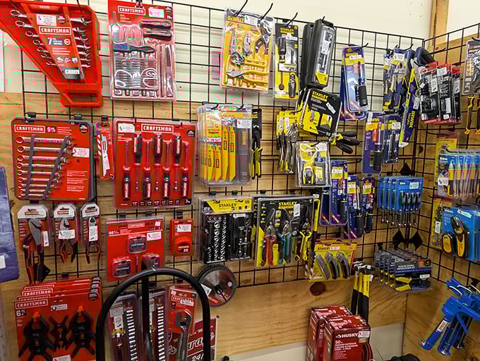 Tool paradise for DIY dreamers—Craftsman, Stanley, and more hanging like mechanical candy in a hardware wonderland.