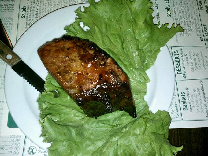 The tri-tip, nestled on its lettuce throne, waiting to convert even the most dedicated salad-eaters to the church of barbecue.