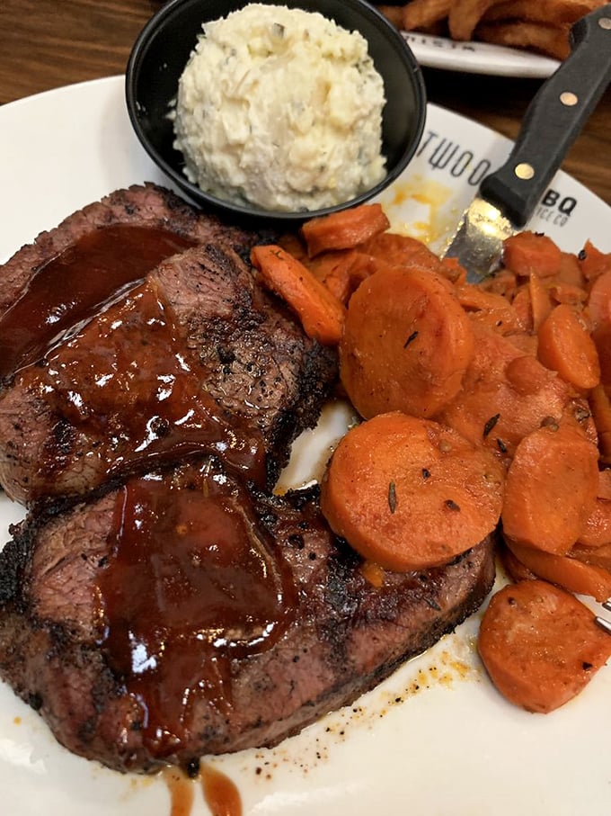Tri-tip perfection paired with glazed carrots and creamy potatoes – comfort food that could convert vegetarians nationwide.