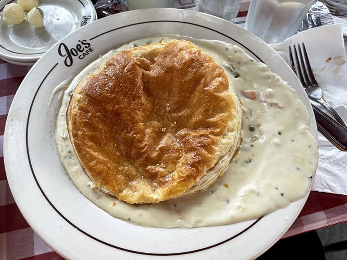 Not just any pot pie – a golden-domed fortress of comfort food that makes you wonder why you'd ever attempt this at home.