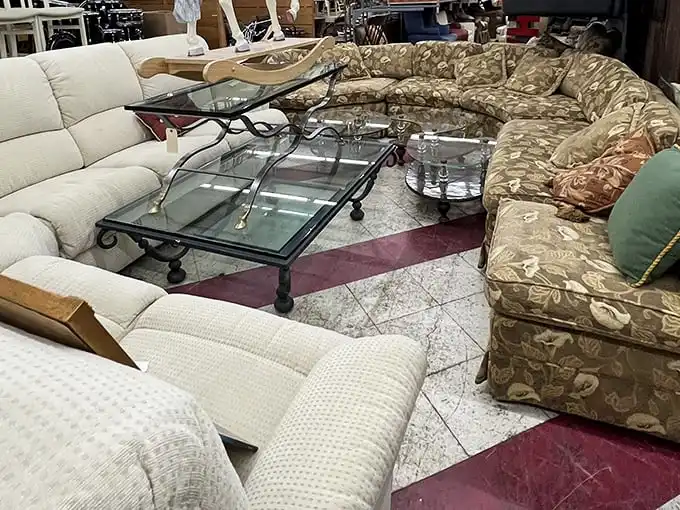 The living room section – where sectional sofas with stories to tell await their second act in your binge-watching adventures.