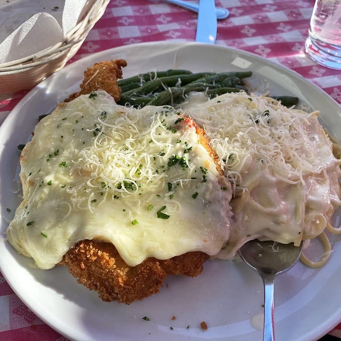 When cheese blankets meet crispy breading, magic happens – and green beans become the lucky witnesses to greatness.