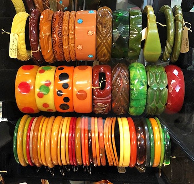 Bakelite bangles in a rainbow of hues that would make a box of Crayolas jealous. Wearable art with more personality than most modern accessories.
