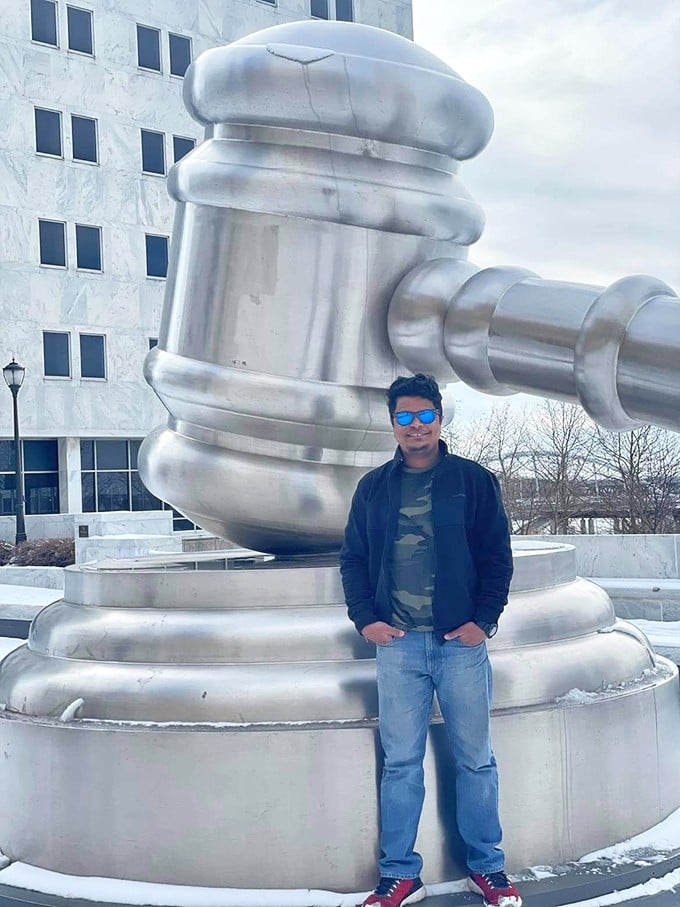 "Your Honor, I object to how awesome this is!" Visitors can't resist posing with this monumental symbol of justice.