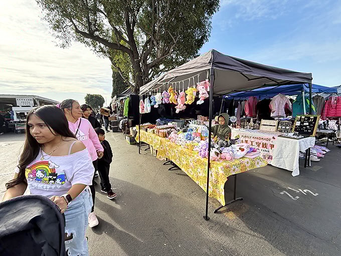 Weekend warriors navigate the bustling aisles, plastic bags already bulging with finds. The serious shoppers came with empty duffel bags—amateur move.