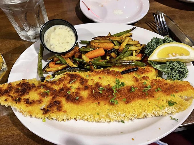 The walleye arrives golden-crusted and tender within, proving that lake-to-plate perfection doesn't require an ocean view—just Wisconsin know-how.