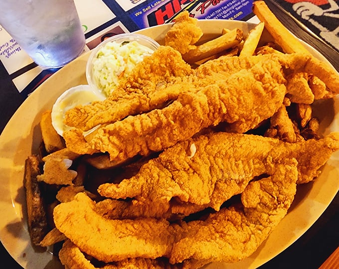 Golden perfection on a plate. These walleye strips are what fish dreams are made of—crispy exterior giving way to flaky, tender fish that practically melts on your tongue.