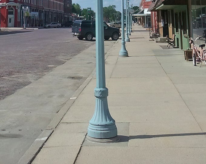 Those vintage lampposts aren't just for show – they've illuminated generations of evening strolls along North Webster Street.