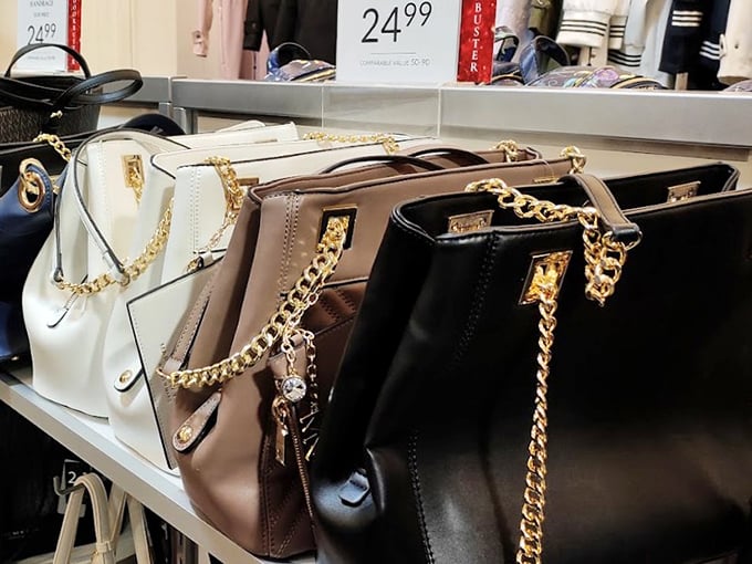 Designer handbags lined up like beauty pageant contestants, each one silently whispering, "Pick me, I'll make your outfit complete!"