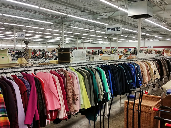 The women's section is organized by color, creating a rainbow road of fashion possibilities spanning decades of style.