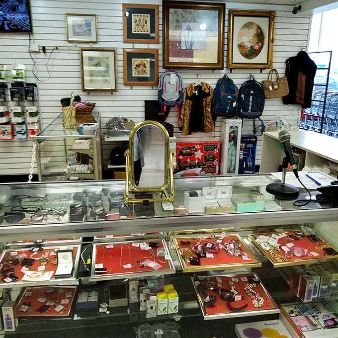 The accessories counter gleams with yesterday's treasures—vintage jewelry, watches, and sunglasses await their chance to shine again.