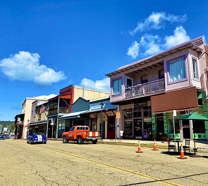 Vibrant buildings in sunset hues create Jackson's postcard-perfect downtown. That vintage truck isn't a prop—it's someone's daily driver!