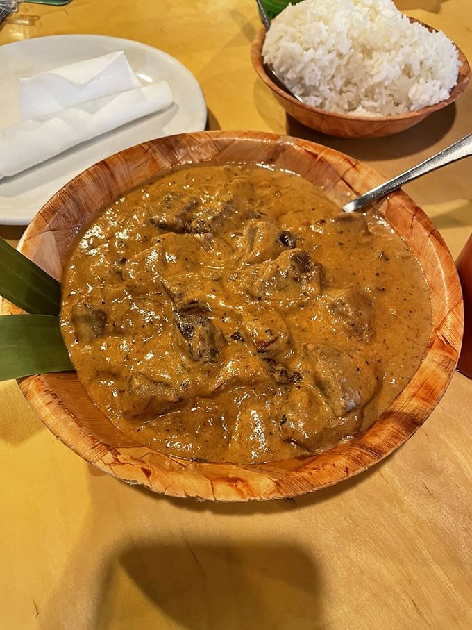 Mama Leah's Coconut Beef isn't just a meal, it's a revelation—chunks of smoked chuck roast swimming in a coconut cream that would make a vegetarian reconsider life choices.