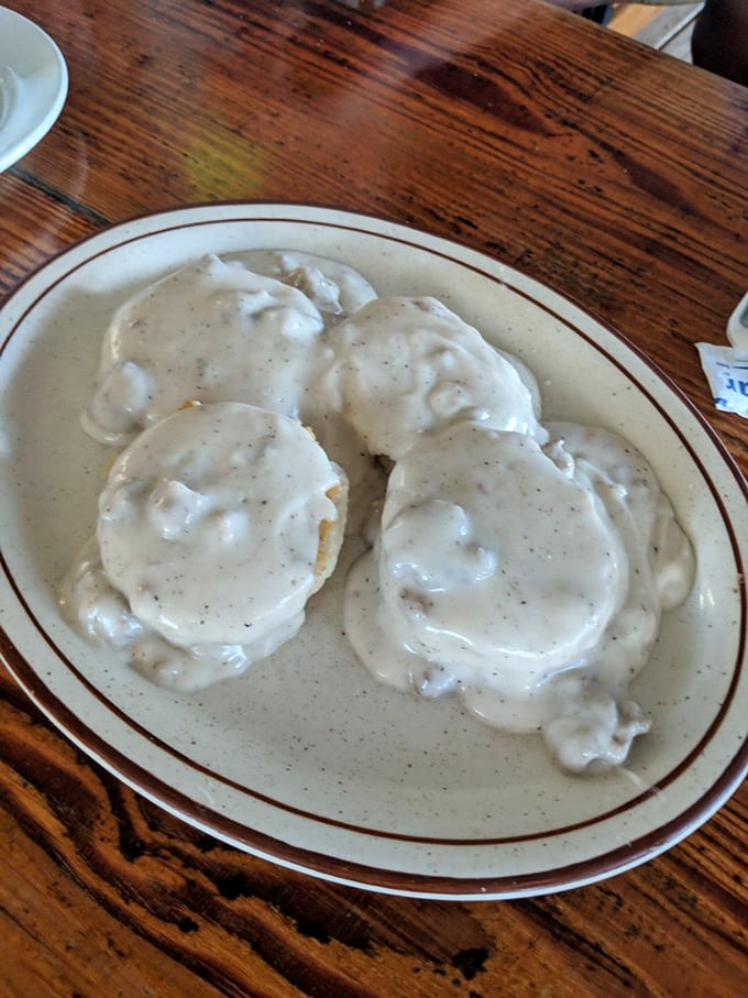 Those biscuits smothered in sausage gravy aren't just breakfast – they're edible Southern poetry with a pepper kick that wakes up your taste buds.