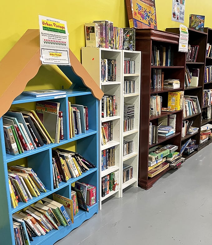 A house-shaped bookshelf holding actual house-shaped knowledge – it's like inception for readers on a budget.